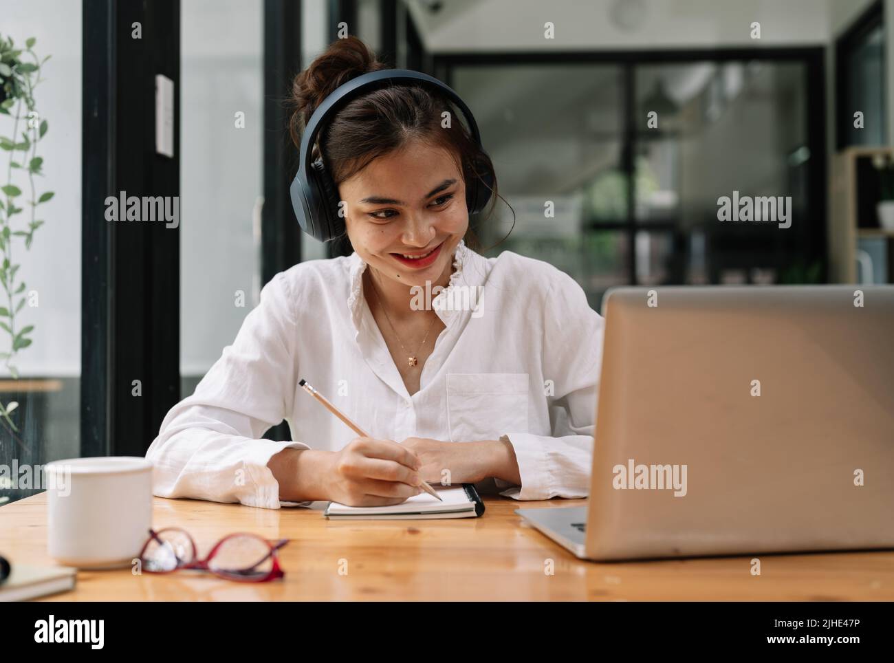 close up of Student learning online class by using laptop computer and ...