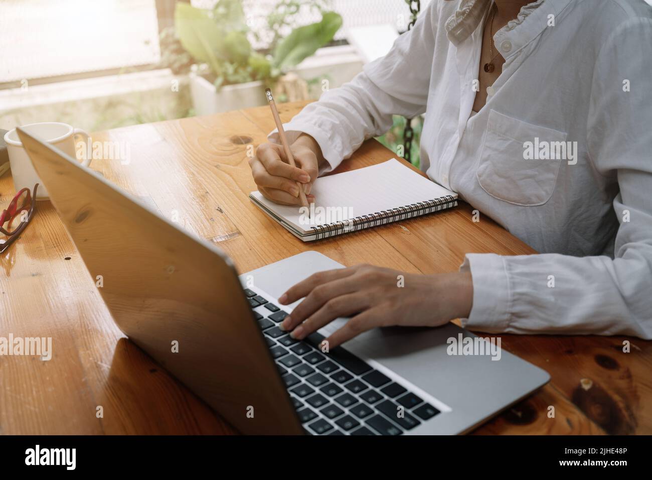 close up of Student learning online class by using laptop computer and ...