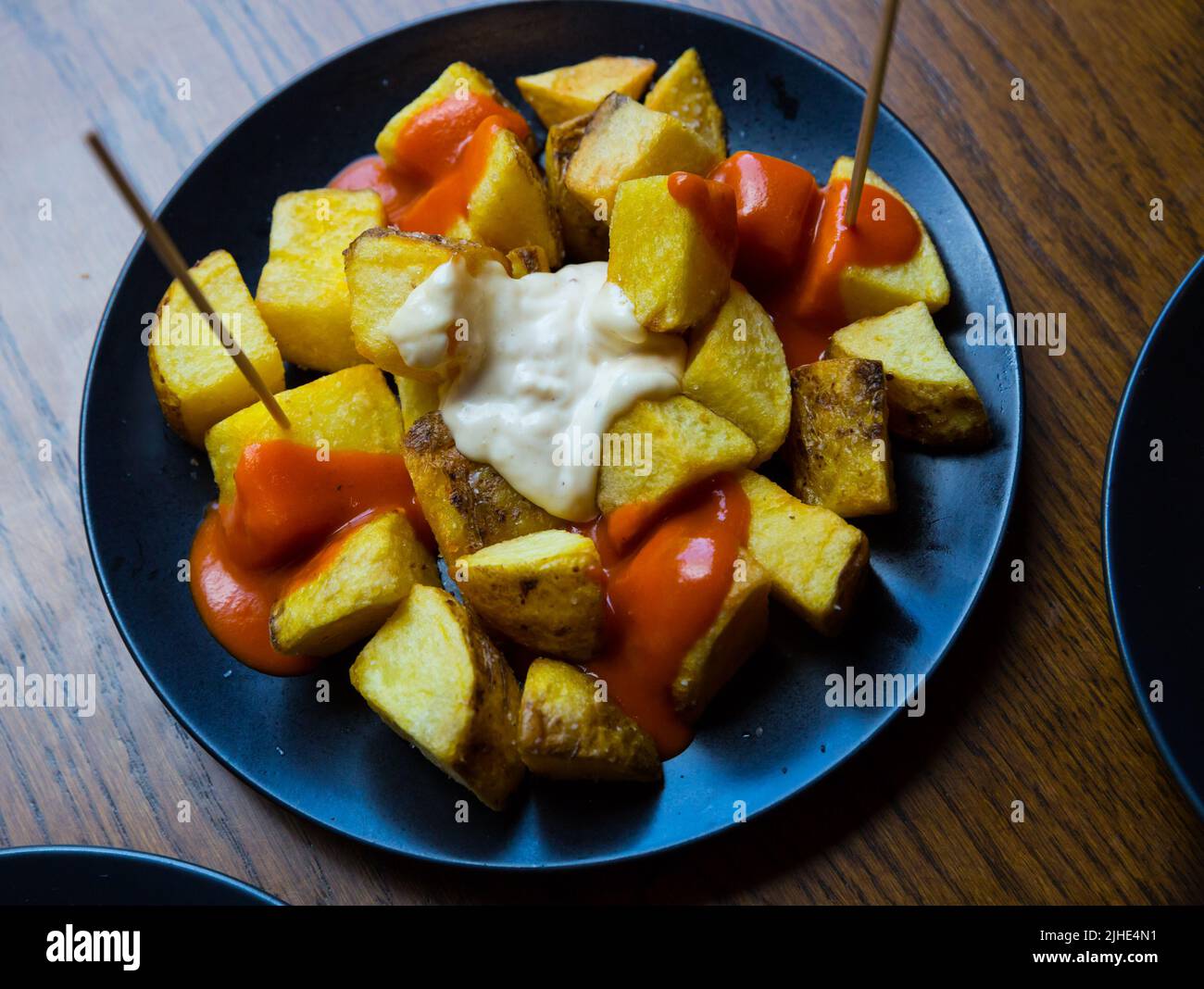 Spanish Patatas bravas tapas Stock Photo - Alamy