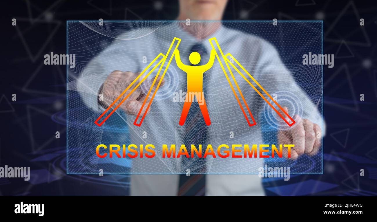 Man touching a crisis management concept on a touch screen with his ...