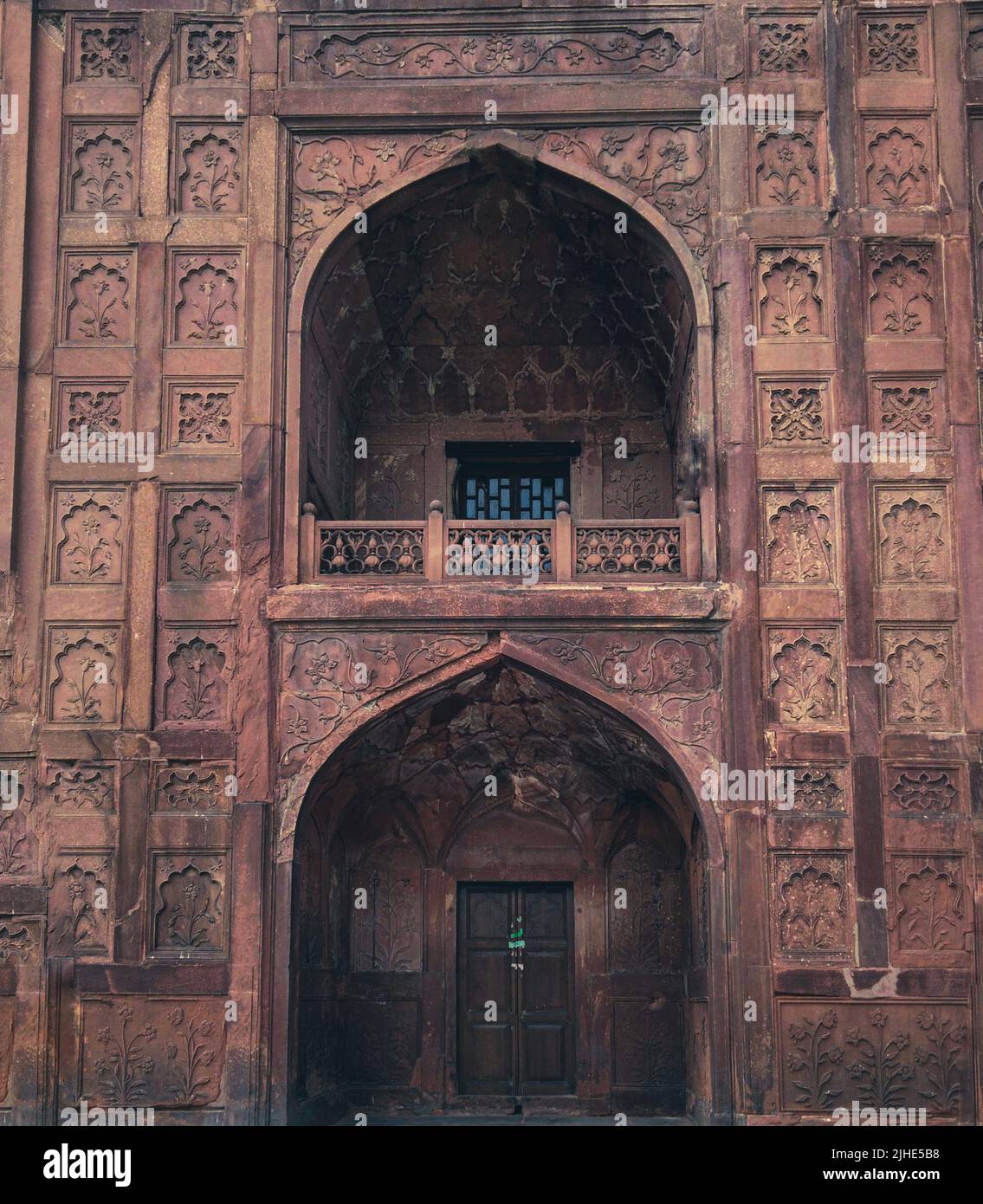 A vertical shot of the beautiful decorated facade of Naubat Khana (Red ...