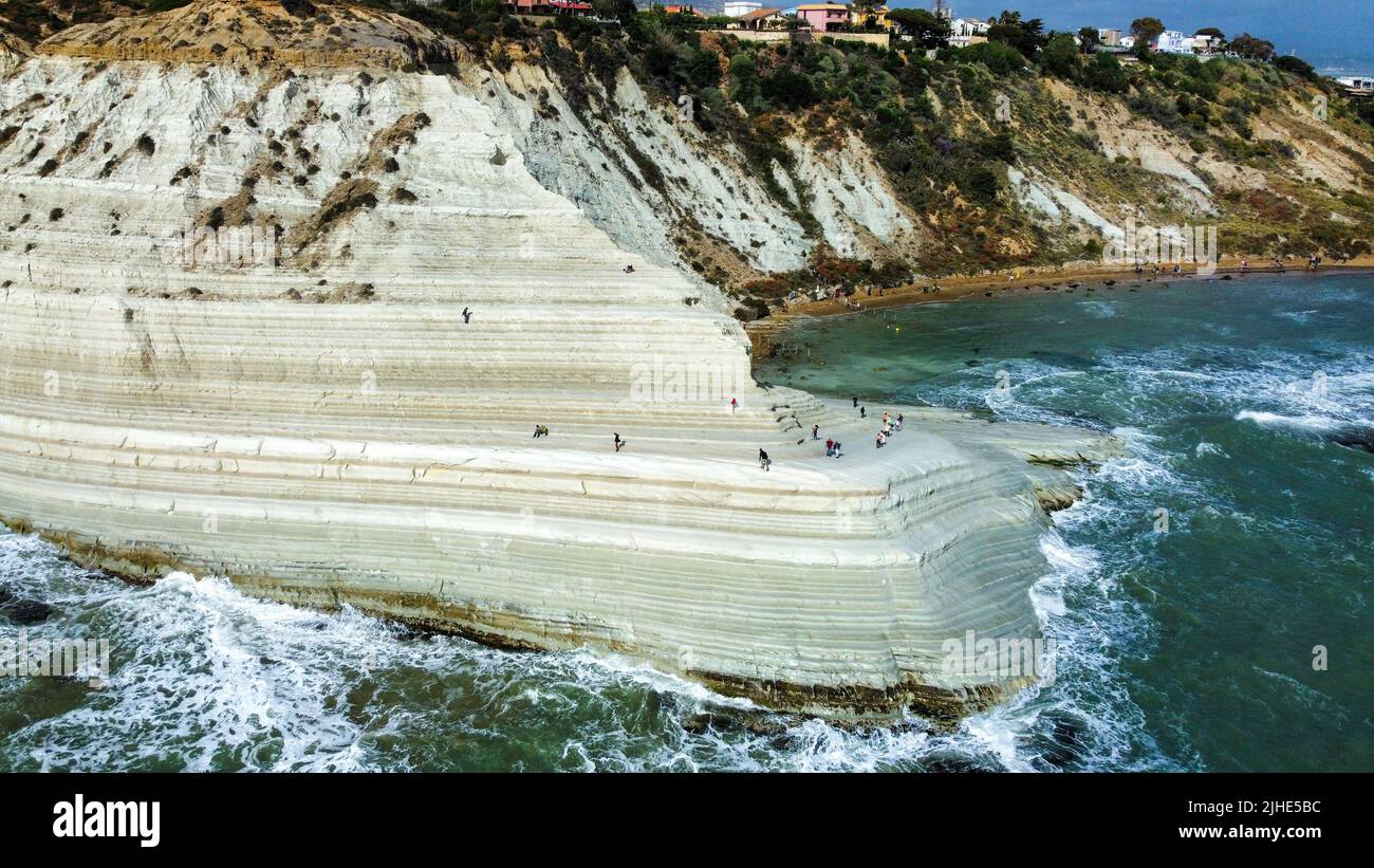 A tranquil view of the Stair of the Turks cliffs by water waves in ...