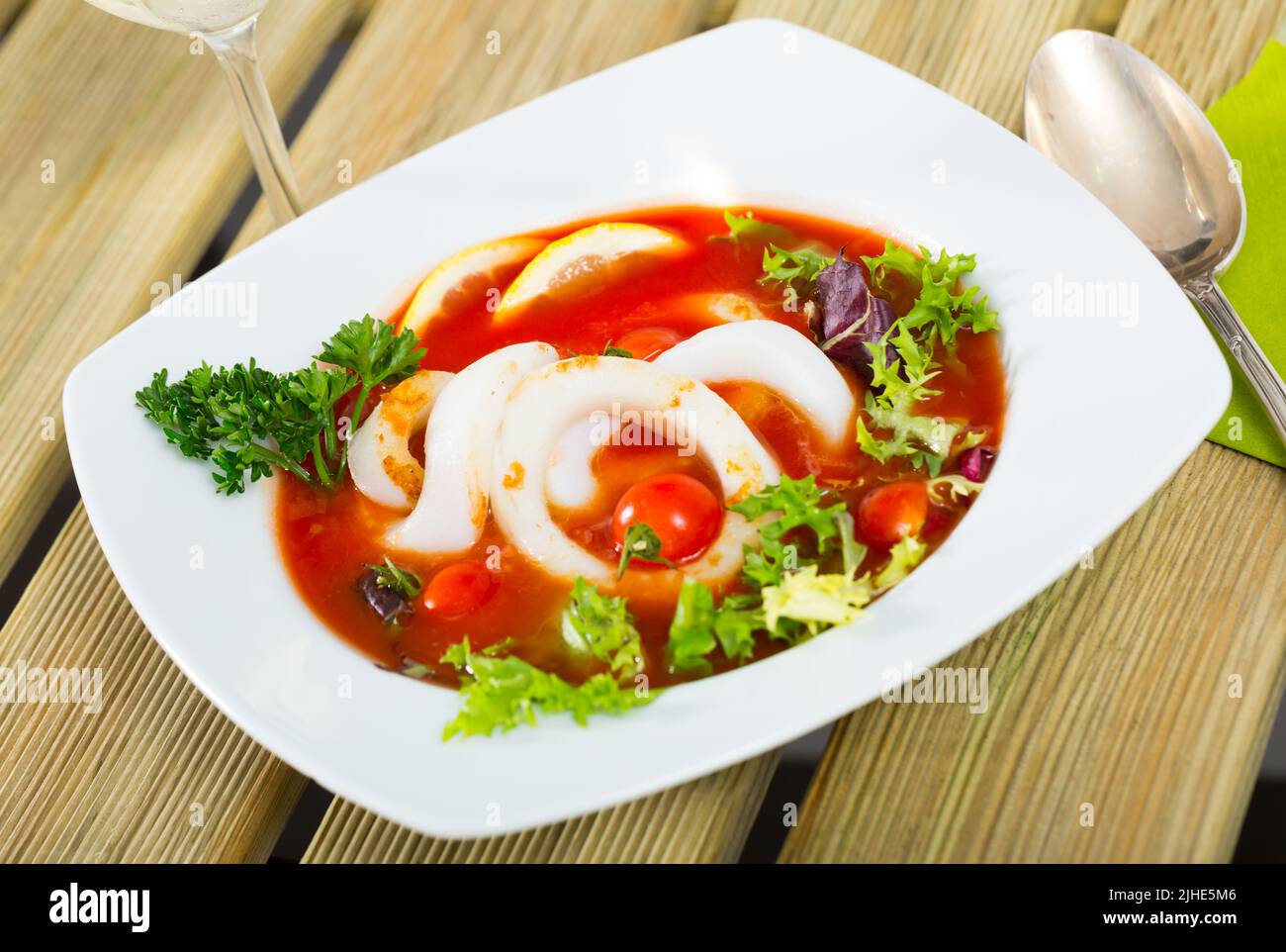 Image of tomato soup with squid Stock Photo - Alamy