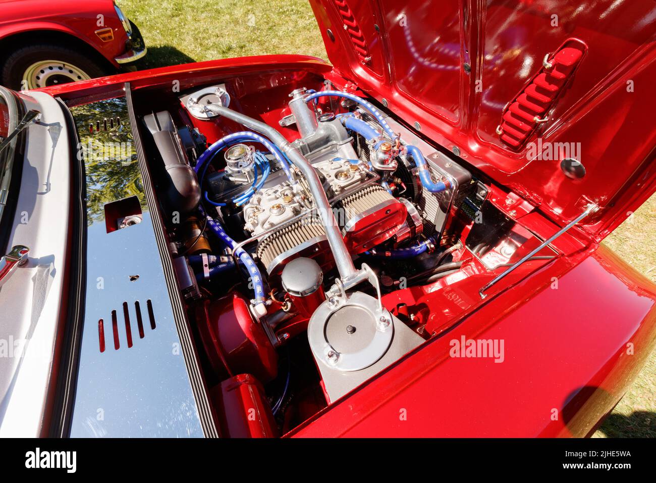 engine bay with hood bonnet open of red classic vintage sports car ...