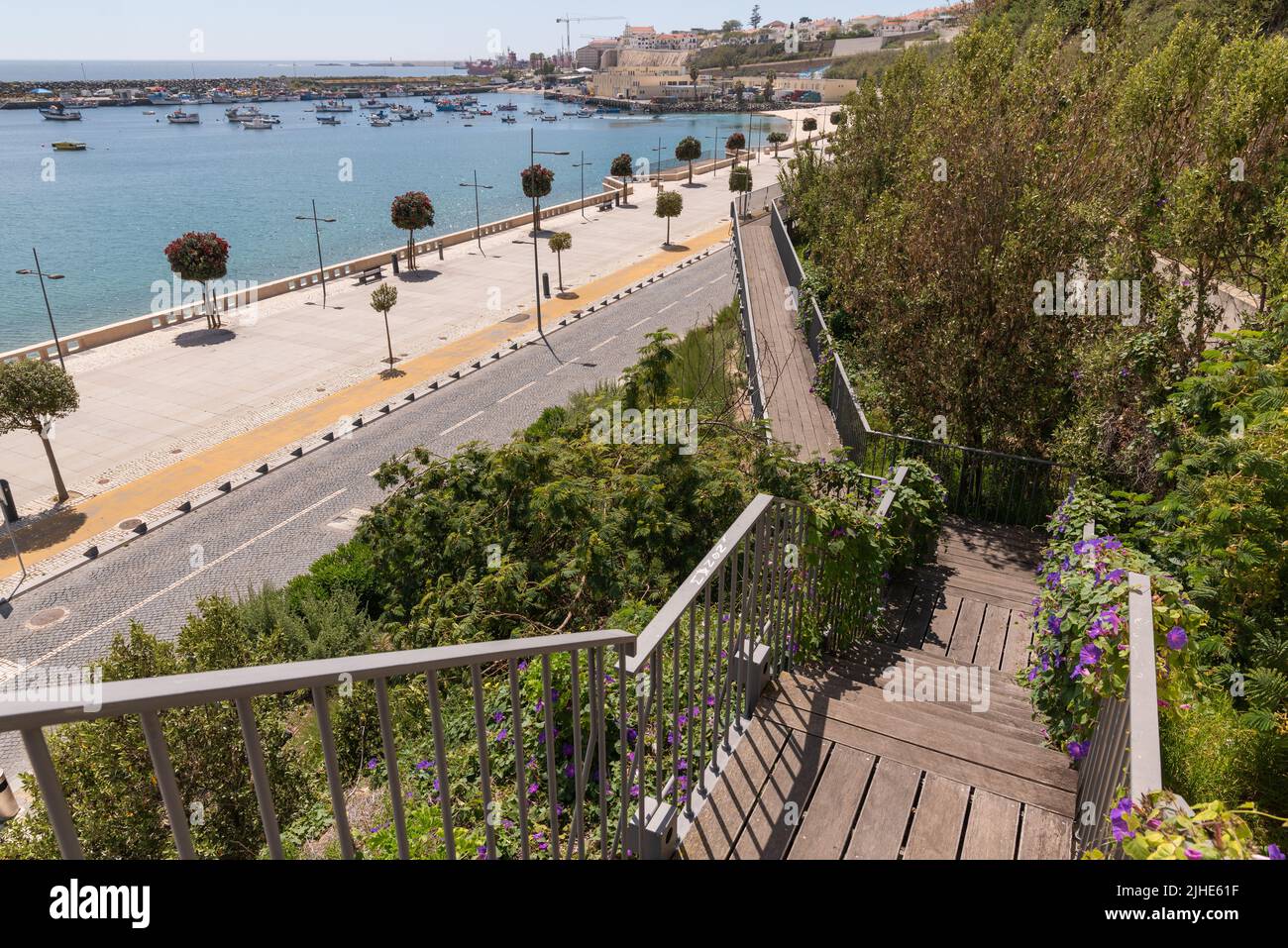 The high-angle view of the stairways leading to Sines' town beach Praia ...