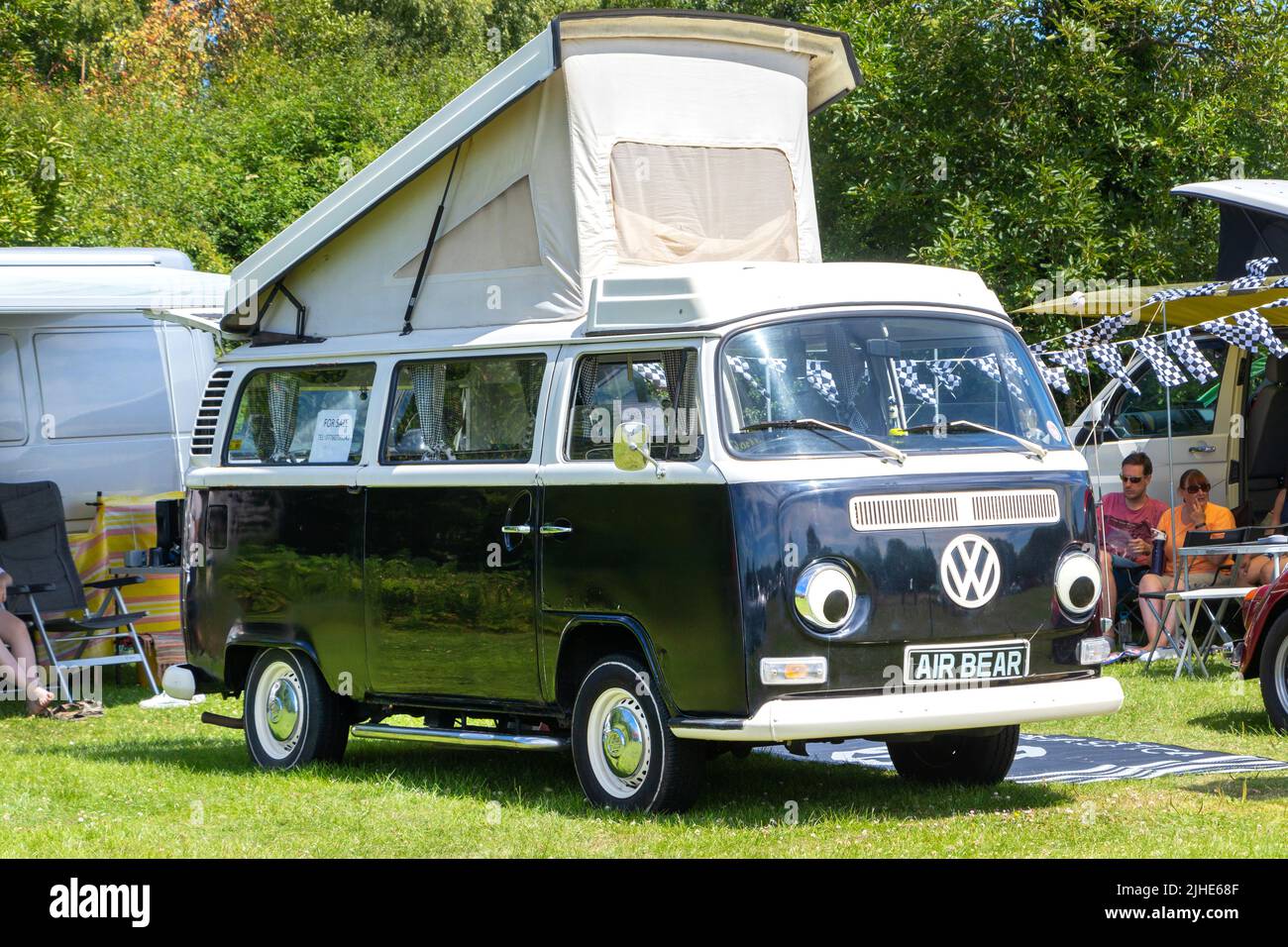 vintage black Volkswagen Type 2 transporter Kombi or microbus with pop ...