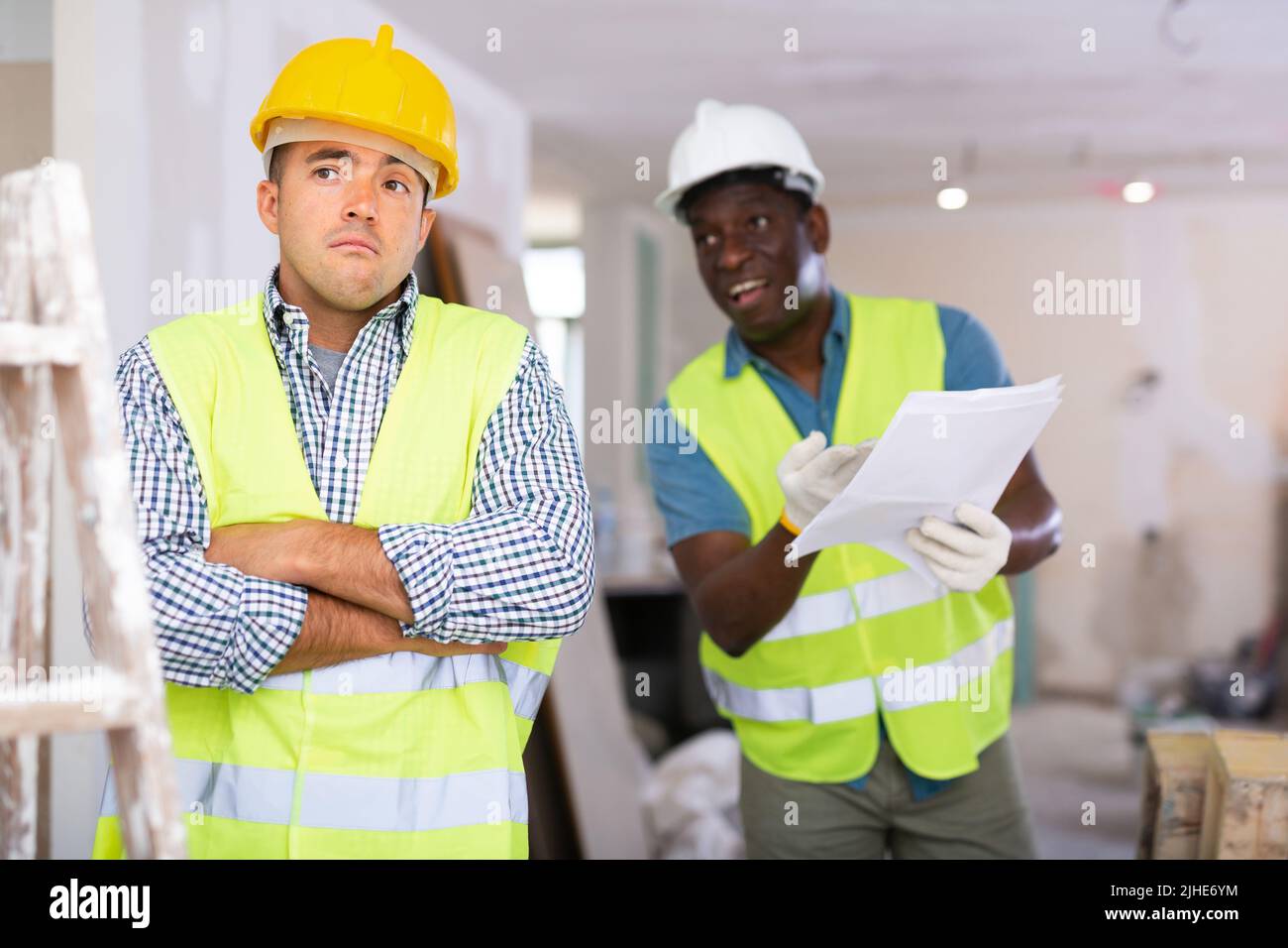 Foreman dissatisfied with quality of repair work of builder closeup ...