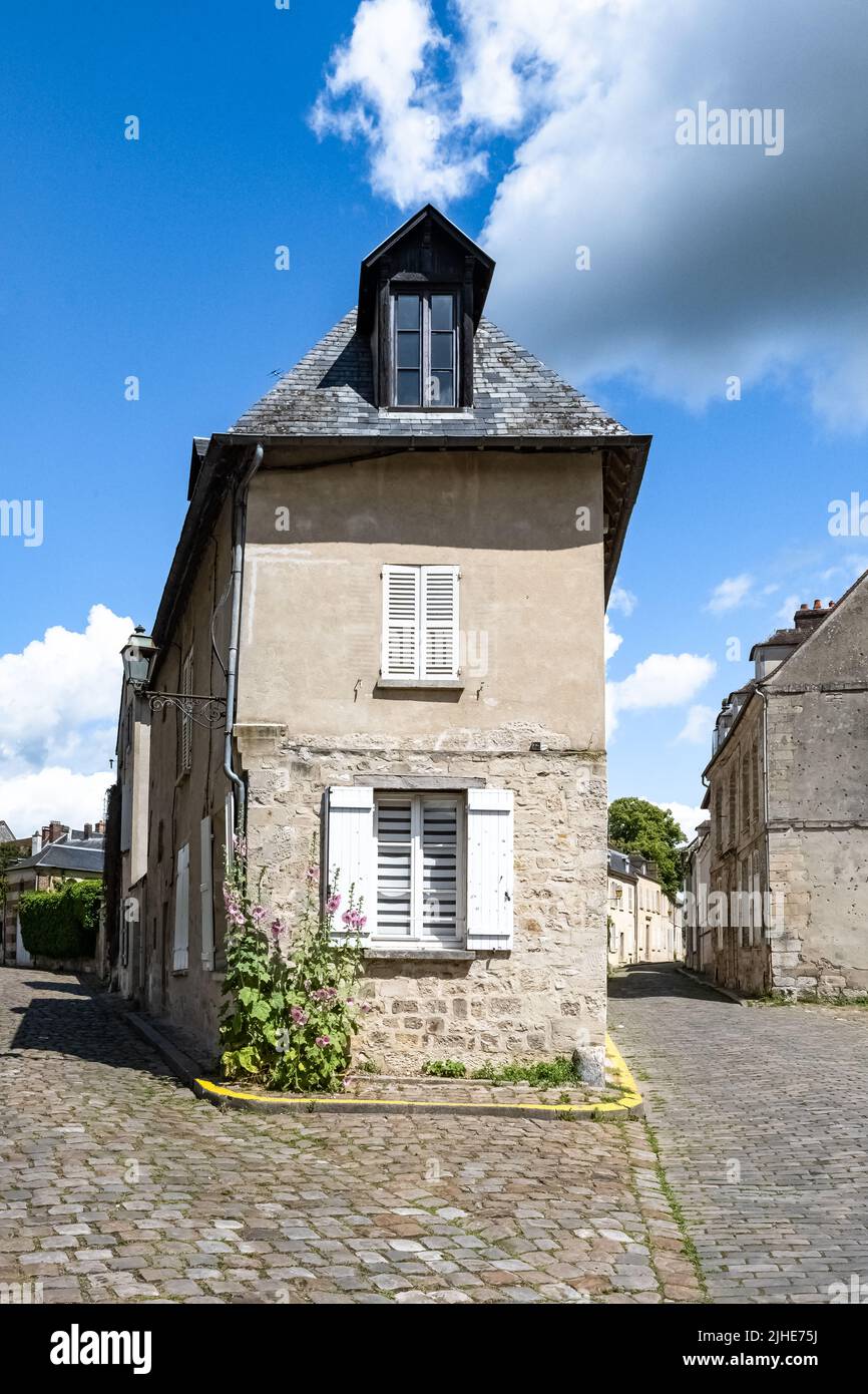 Senlis, medieval city in France, typical cobblestone street with ...