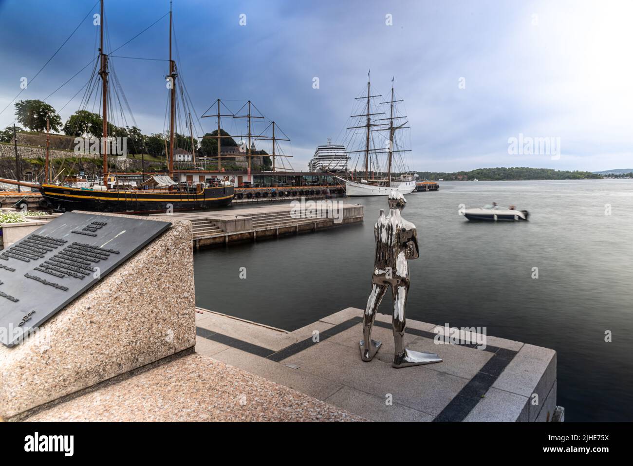 A tour of Oslo Norway with the piers and City Hall in the middle of ...
