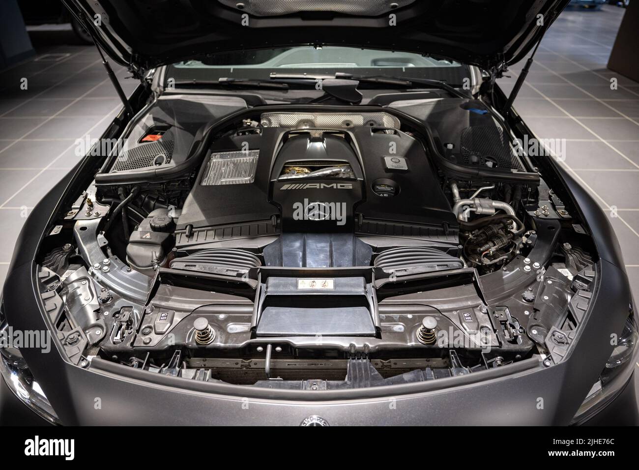 A black Mercedes AMG car engine parts in a salon Stock Photo - Alamy