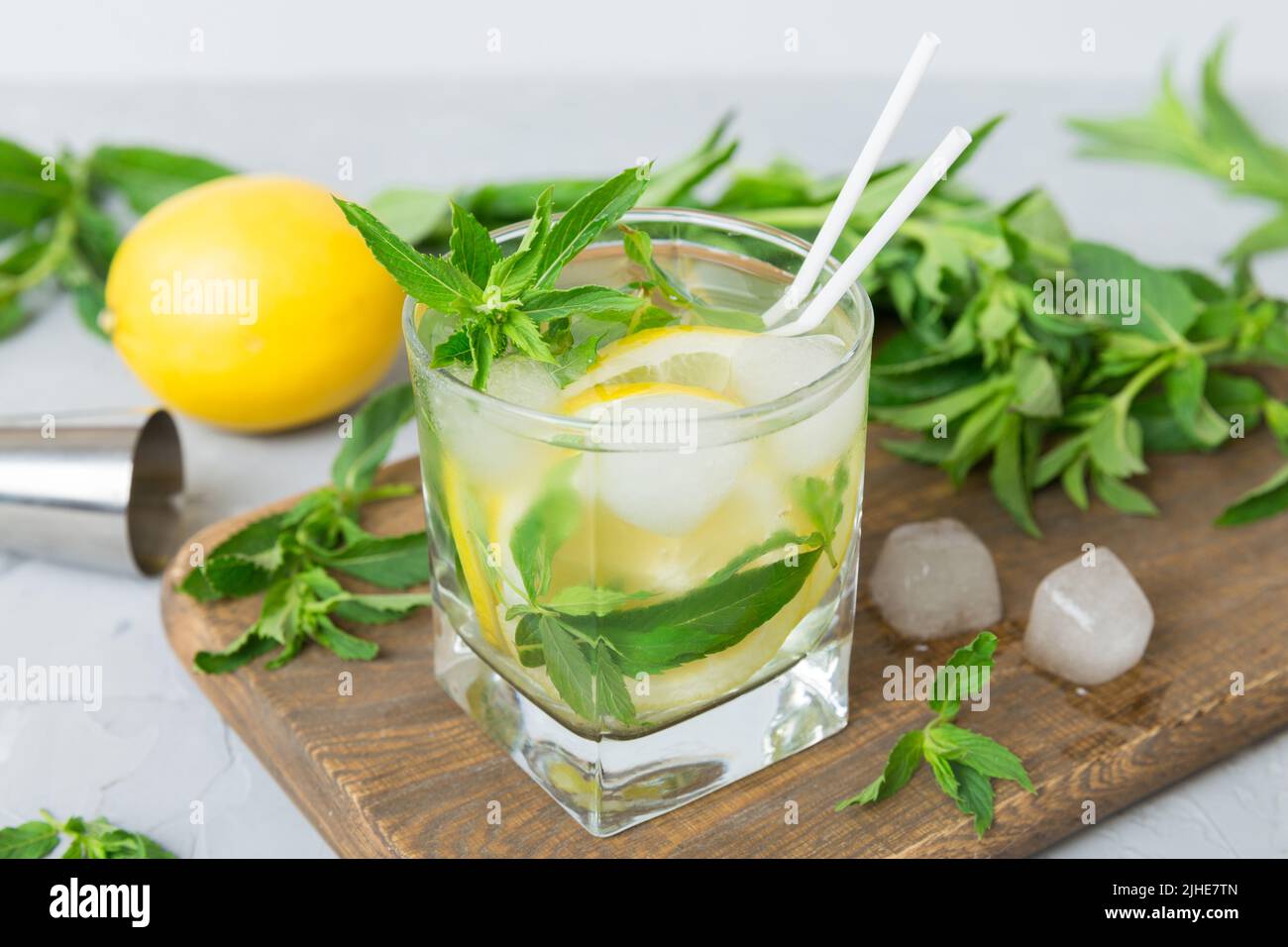 Mojito cocktail. Refreshing mojito cocktail with lime, lemon and mint ...