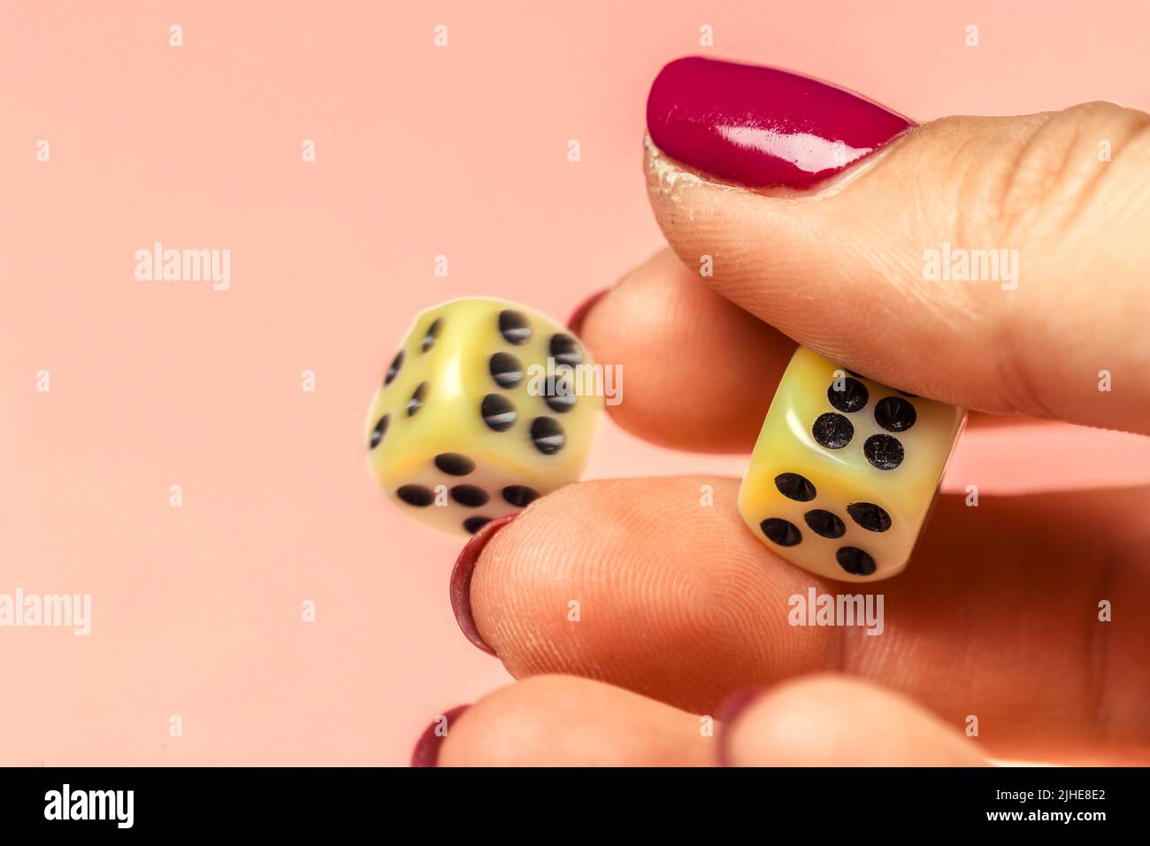 hand with a pair of dice Stock Photo - Alamy
