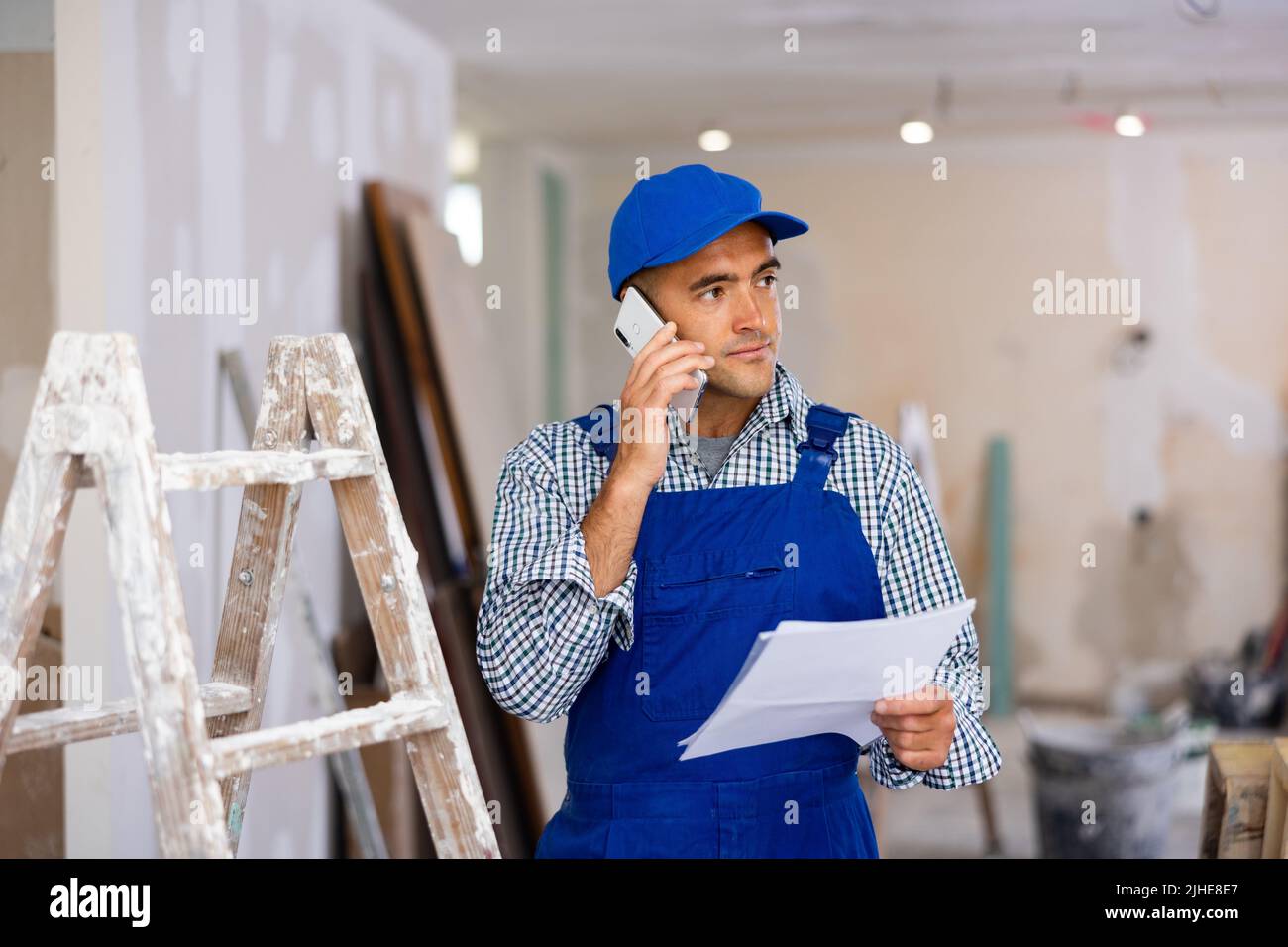 Telephone builder hi-res stock photography and images - Alamy