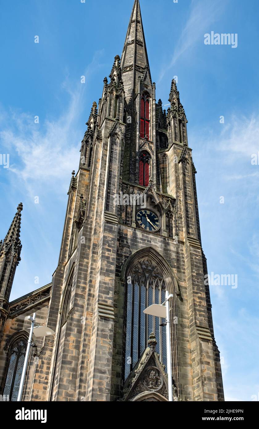 Historical and ancient city centre church or cathedral spire on a ...