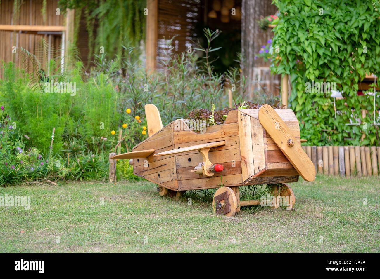 Wood plane decoration in the garden Stock Photo - Alamy