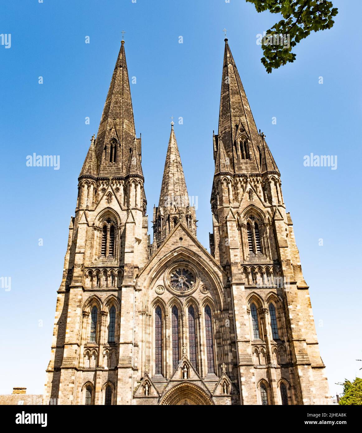 Historical and ancient city centre church or cathedral spire on a ...