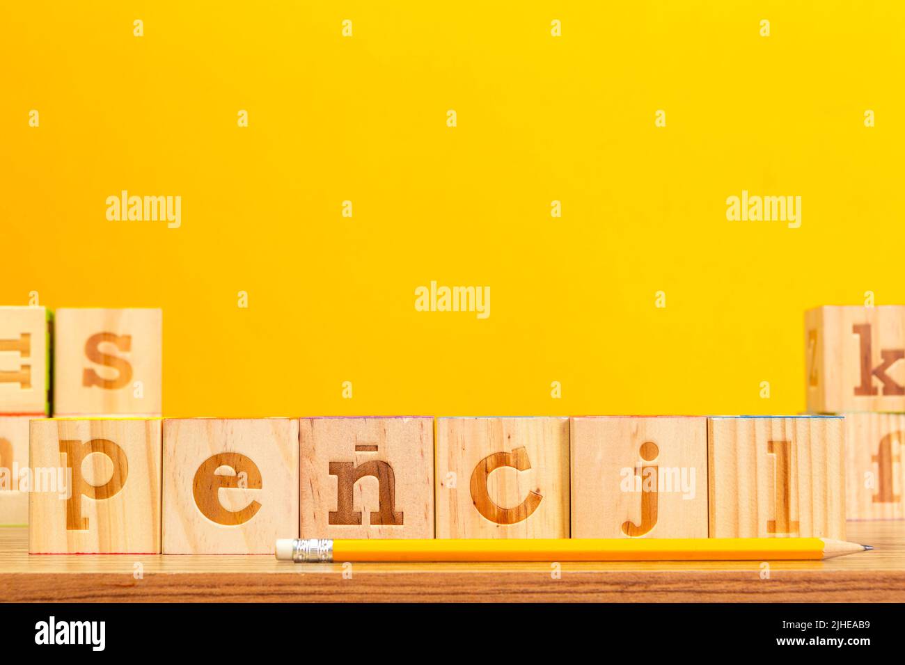 Wooden alphabet blocks with letters Stock Photo - Alamy