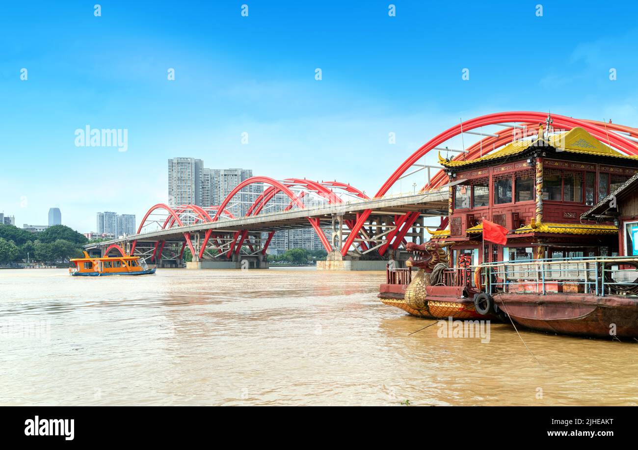 Orange bridge river city skyline, Liuzhou, China Stock Photo - Alamy