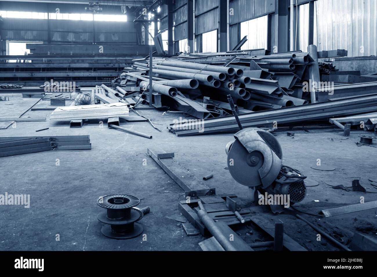 Steel factory floor, stacked with a lot of steel Stock Photo - Alamy