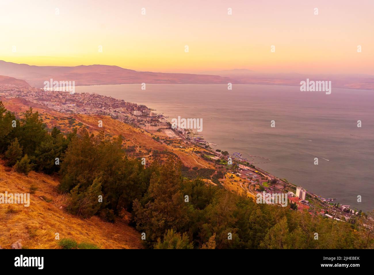 Sunset view of the Sea of Galilee, and the city of Tiberias. Northern ...