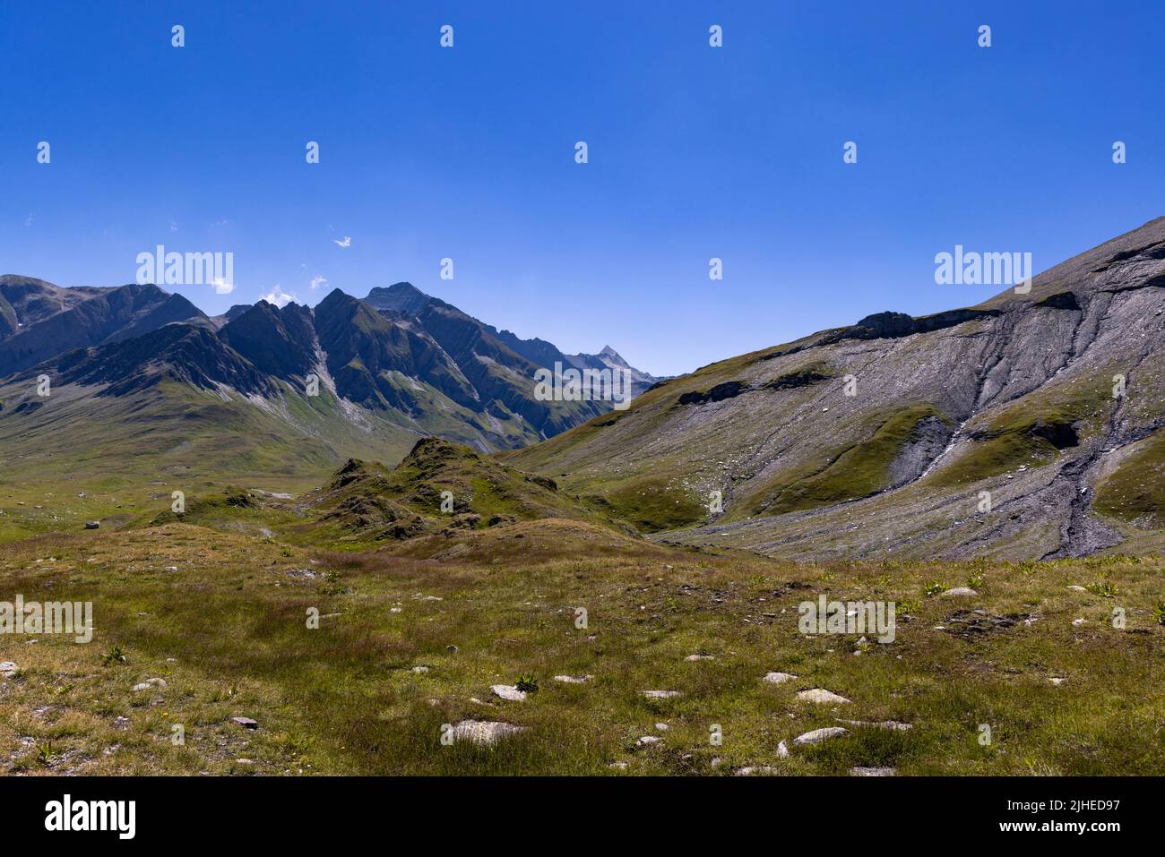 Aerial view towards the high mountains of the Greina plateau in Blenio ...