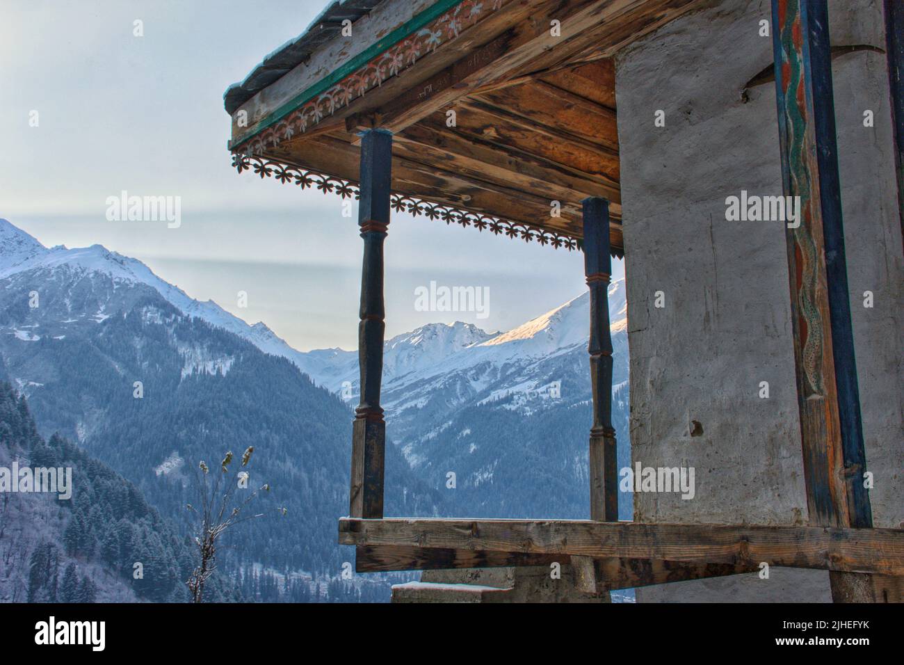 A view from a wooden balcony of the Tosh Parvati Valley in Himachal ...