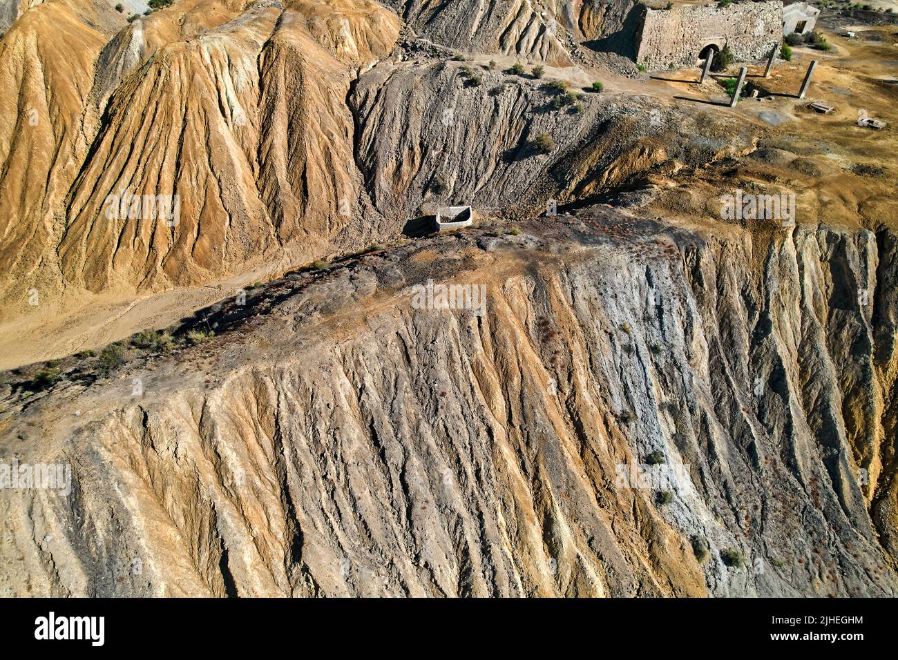 Aerial shot, drone point of view from above old abandoned mines of ...