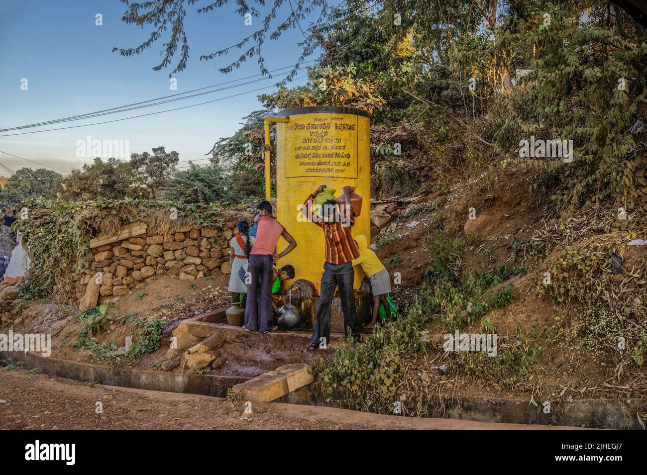 12 22 2010 Villagers collecting water from Community Government Water ...