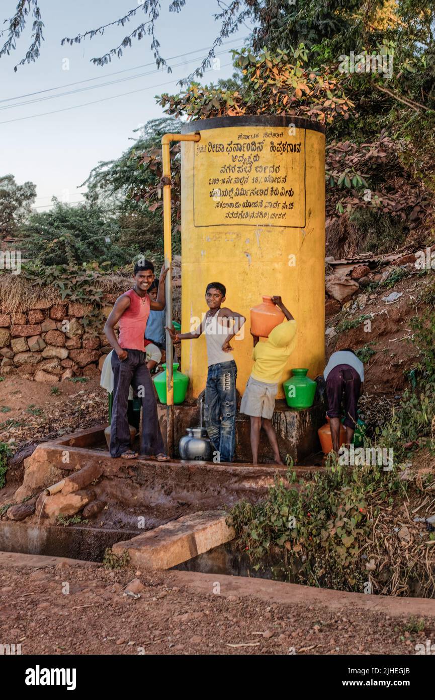 12 22 2010 Villagers collecting water from Community Government Water ...