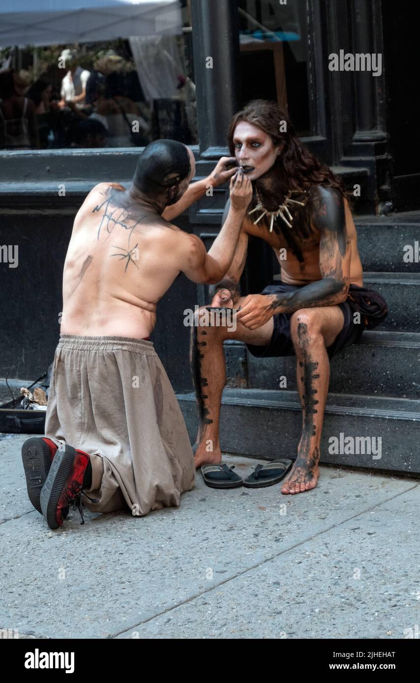 Makeup applied to the lead singer of shock rockers, Wolfspeak. At ...