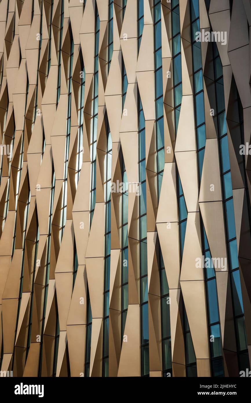 City residential building with crystalline style cladding. Abstract ...