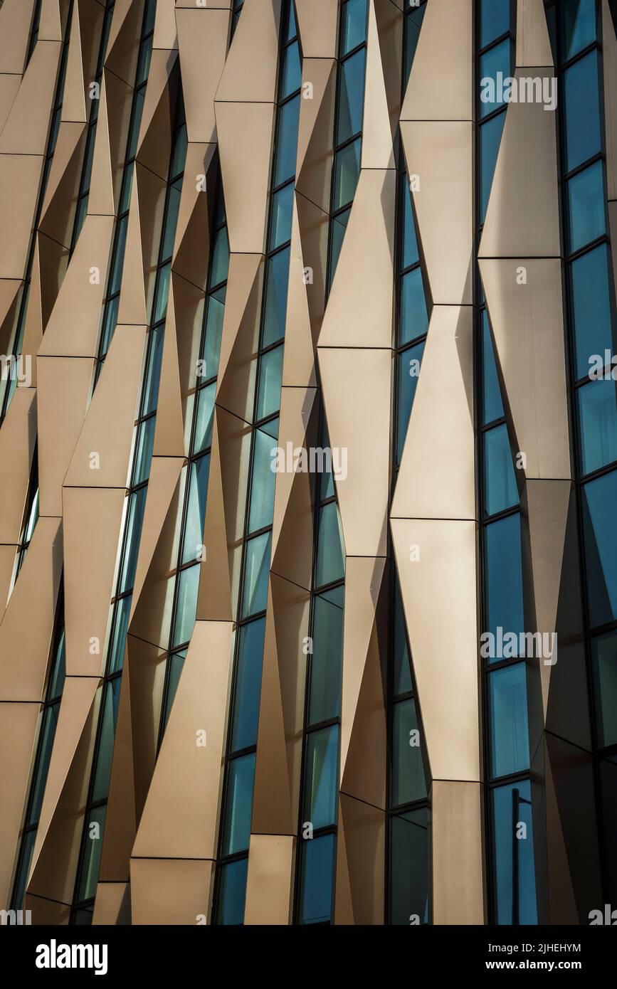 City residential building with crystalline style cladding. Abstract ...