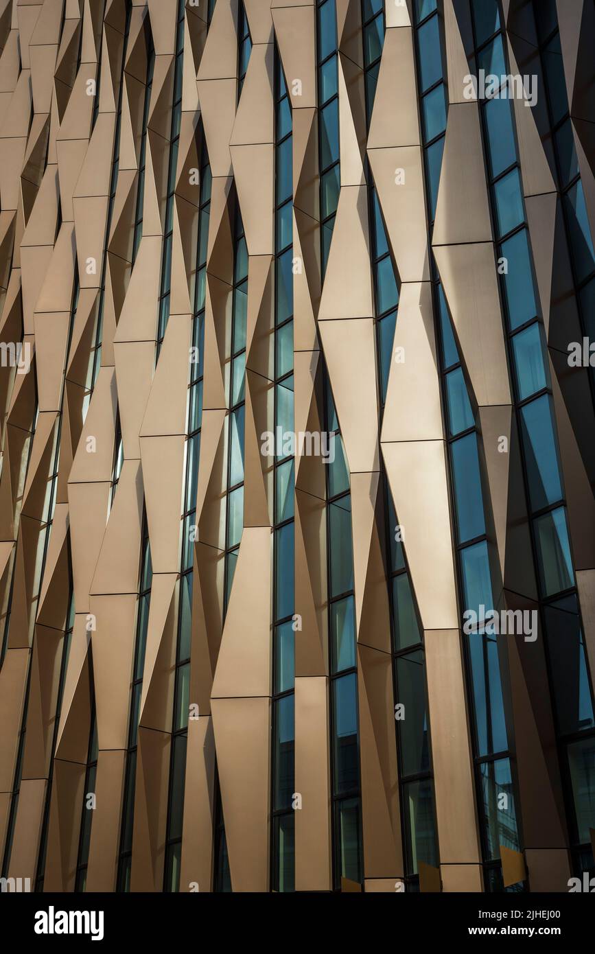 City residential building with crystalline style cladding. Abstract ...