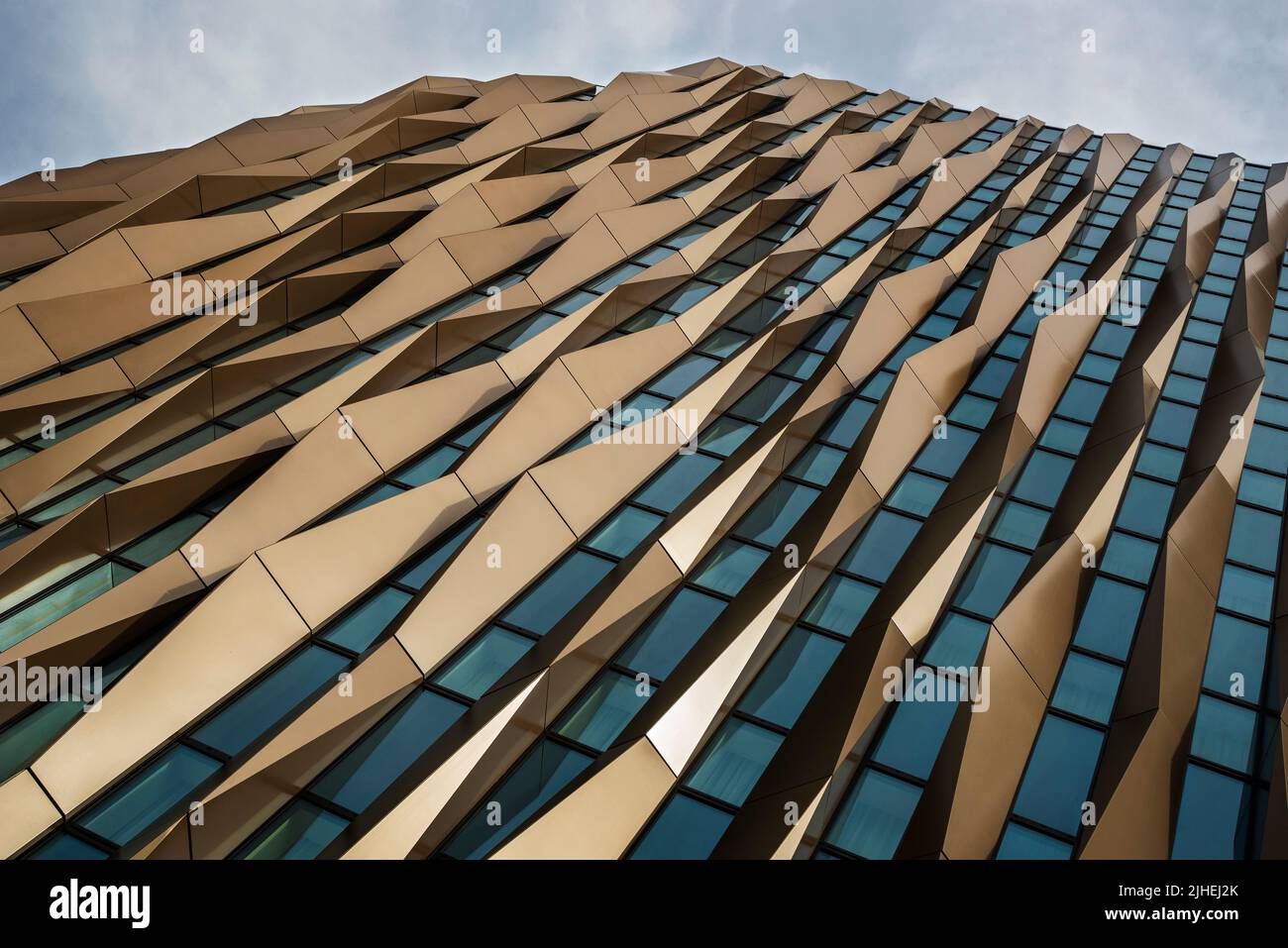 City residential building with crystalline style cladding. Abstract ...