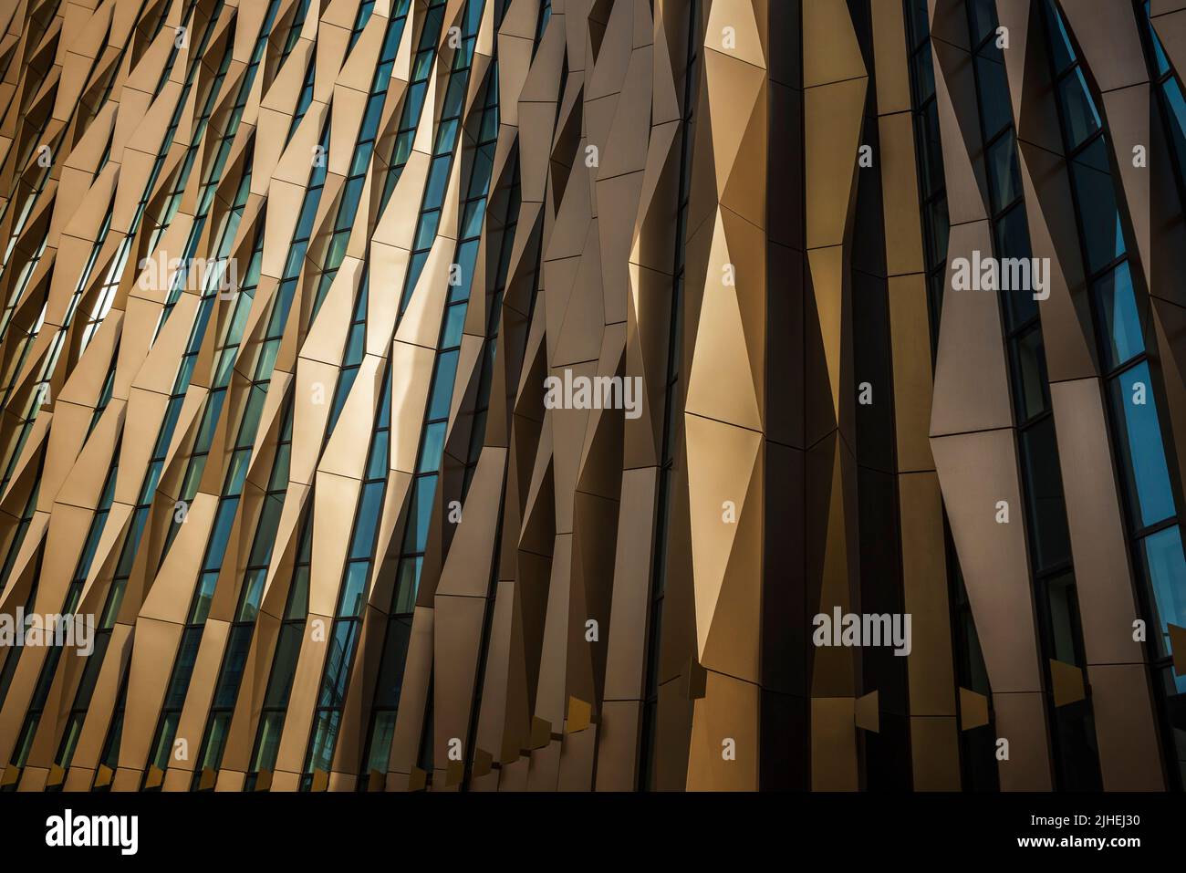 City residential building with crystalline style cladding. Abstract ...