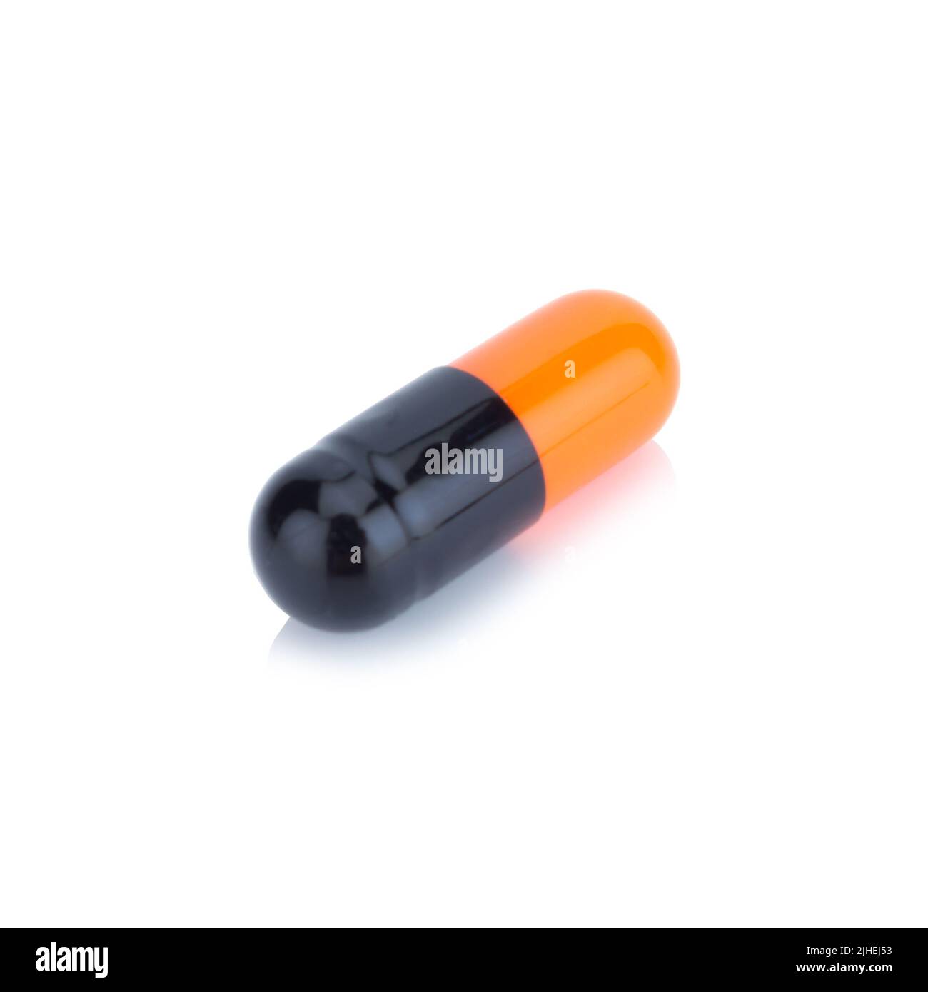 capsule color Black and Orange isolated on white background Stock Photo ...