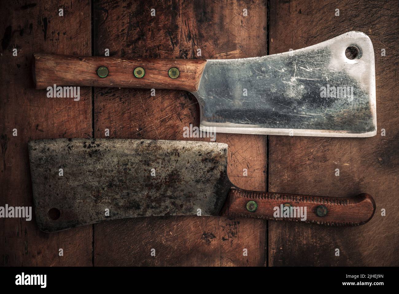 vintage meat butchers set on top of rustic wooden table illustrating ...