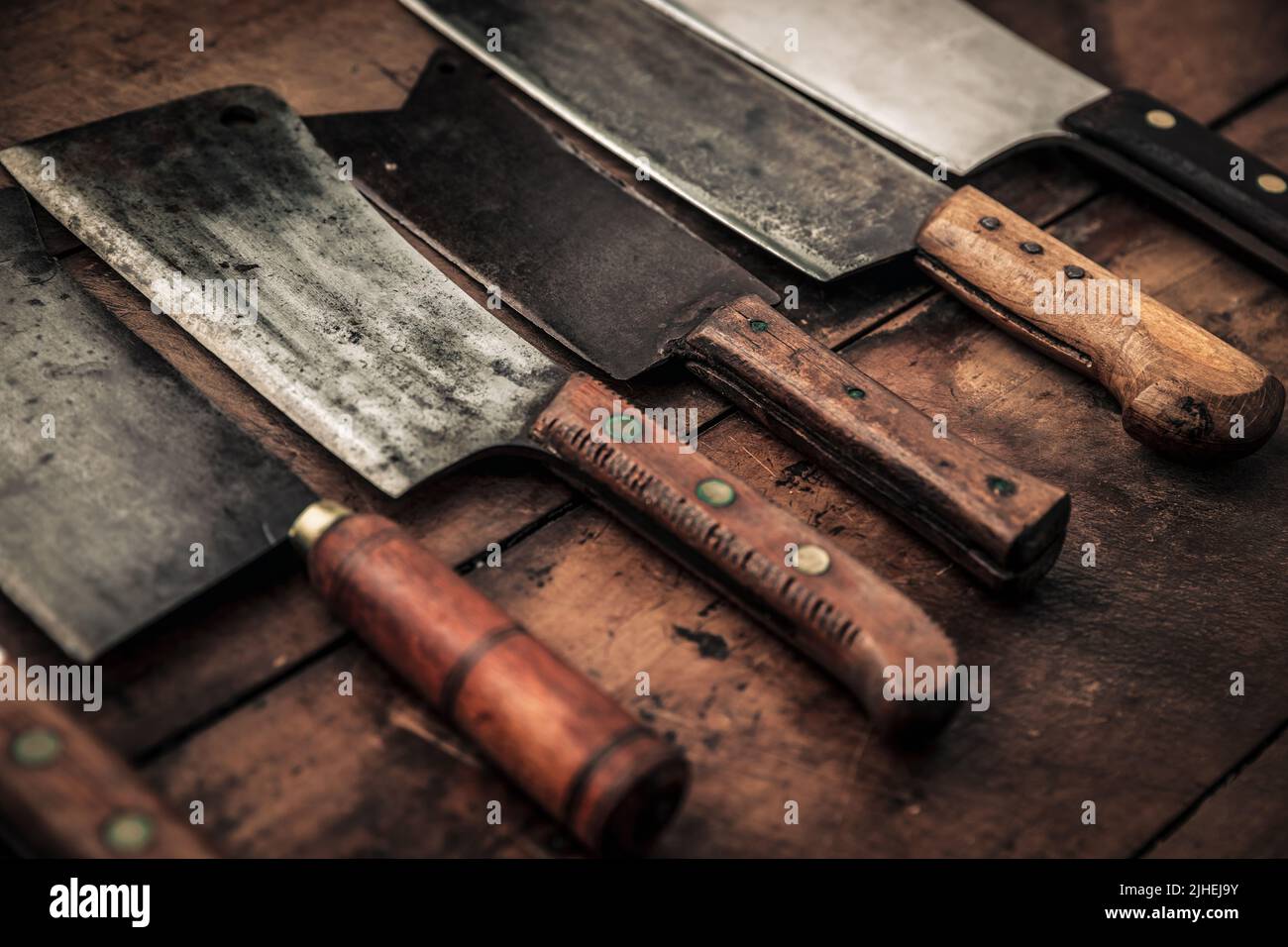 old kitchen collection of different types of meat butchers with sharp ...