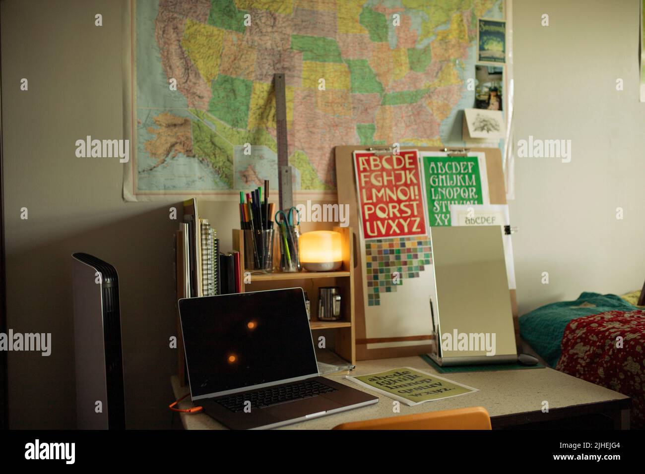 A cozy working and study corner in the bedroom with a desk, laptop and ...