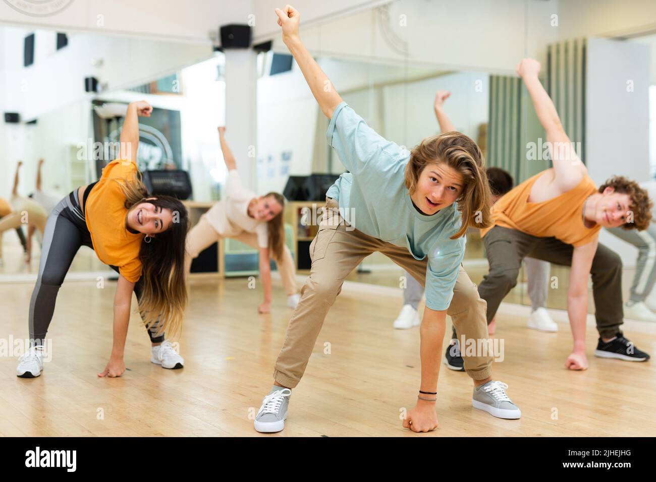 Teens performing modern dance in studio Stock Photo - Alamy