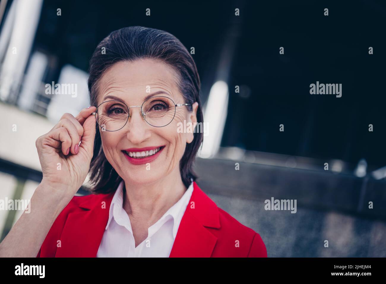 Portrait of charming smart chief lady hold specs enjoy new optician ...