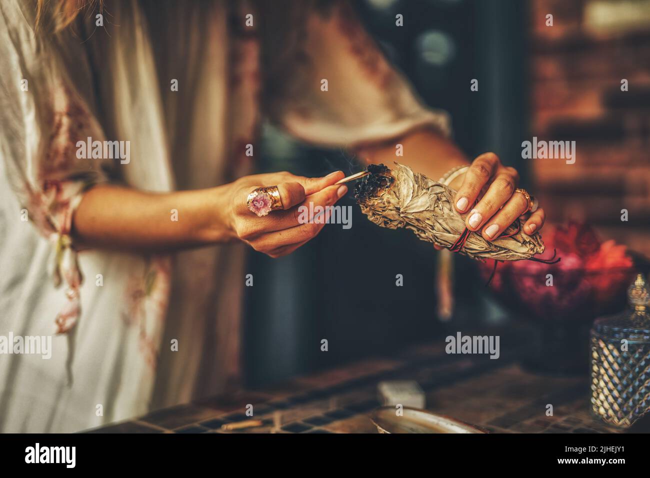 incense in a woman hand, ceremony space Stock Photo - Alamy