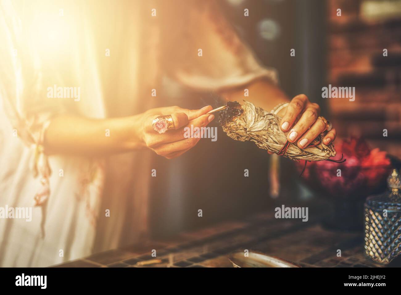 incense in a woman hand, ceremony space Stock Photo - Alamy