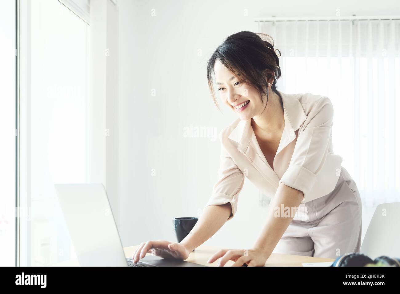 new normal, a businesswoman using computer to work for a company Via ...