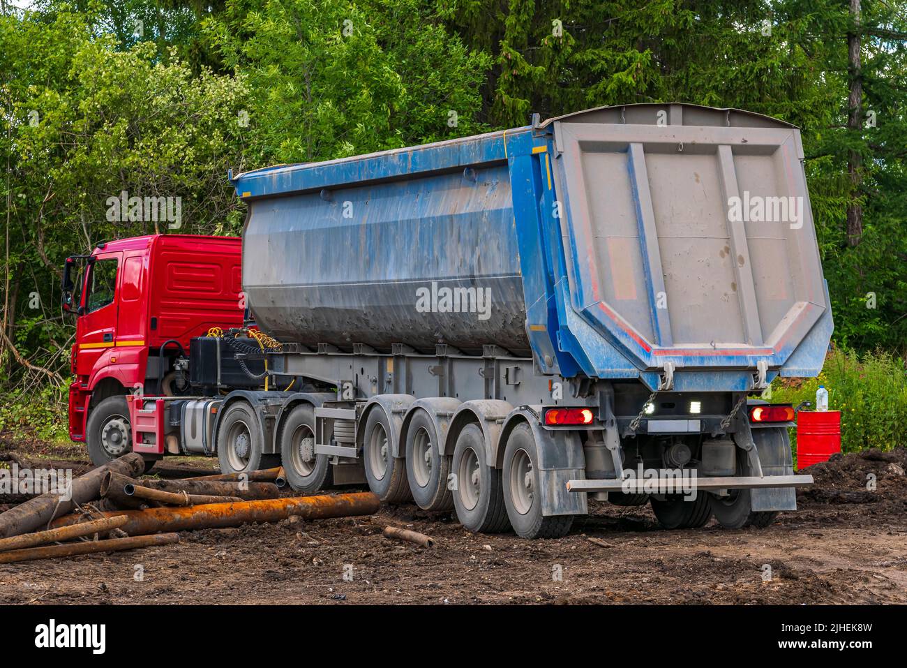 Powerful heavyweight truck moves backwards to place for loading scrap ...