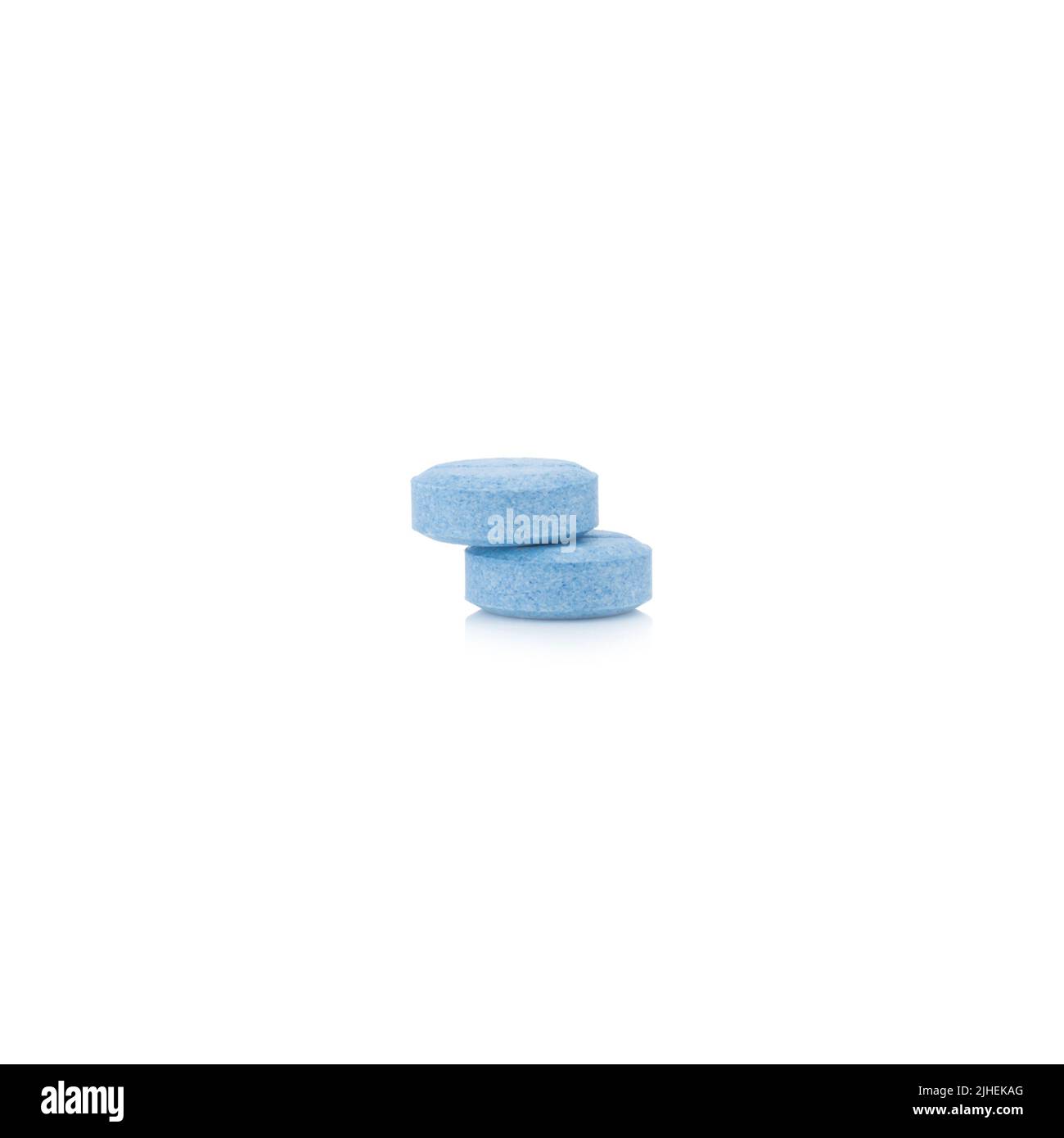 Two pill circle blue isolated on white background Stock Photo - Alamy