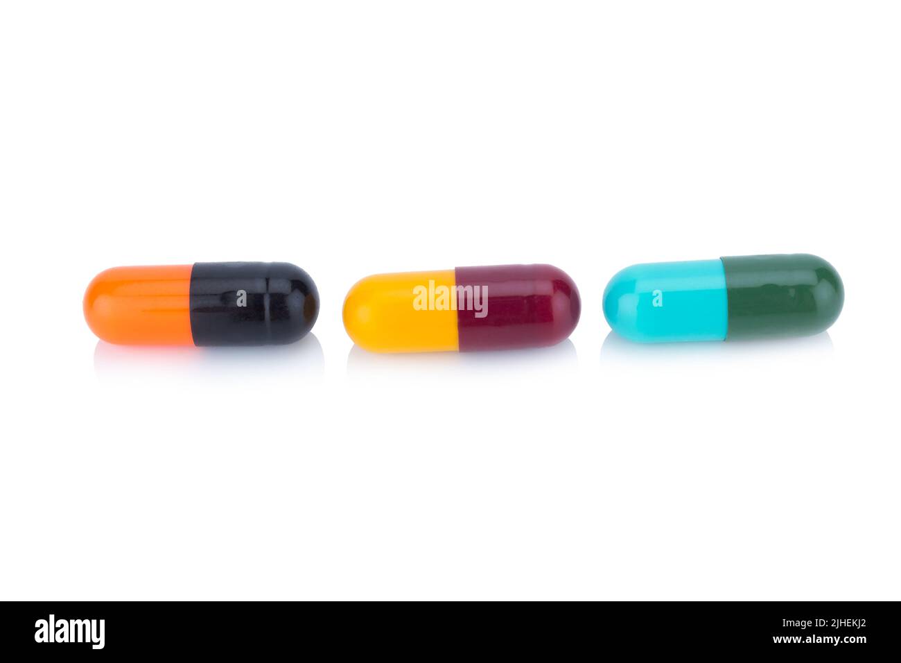 Three capsule color Red Yellow Blue Green Orange and Balck isolated on ...