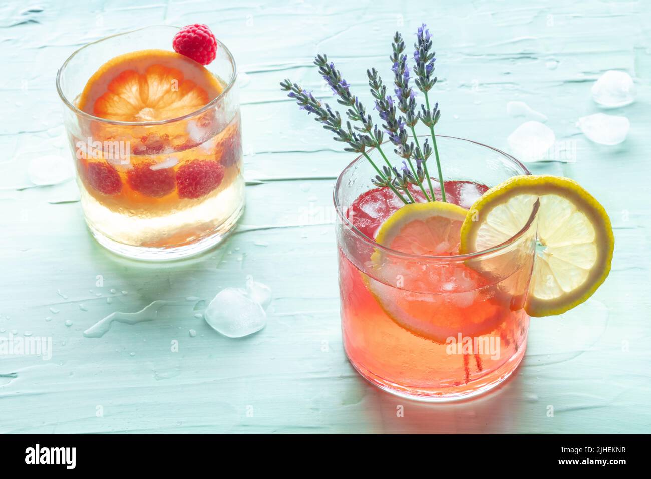 Summer cocktails or mocktails, cold drinks with citrus fruits and ...