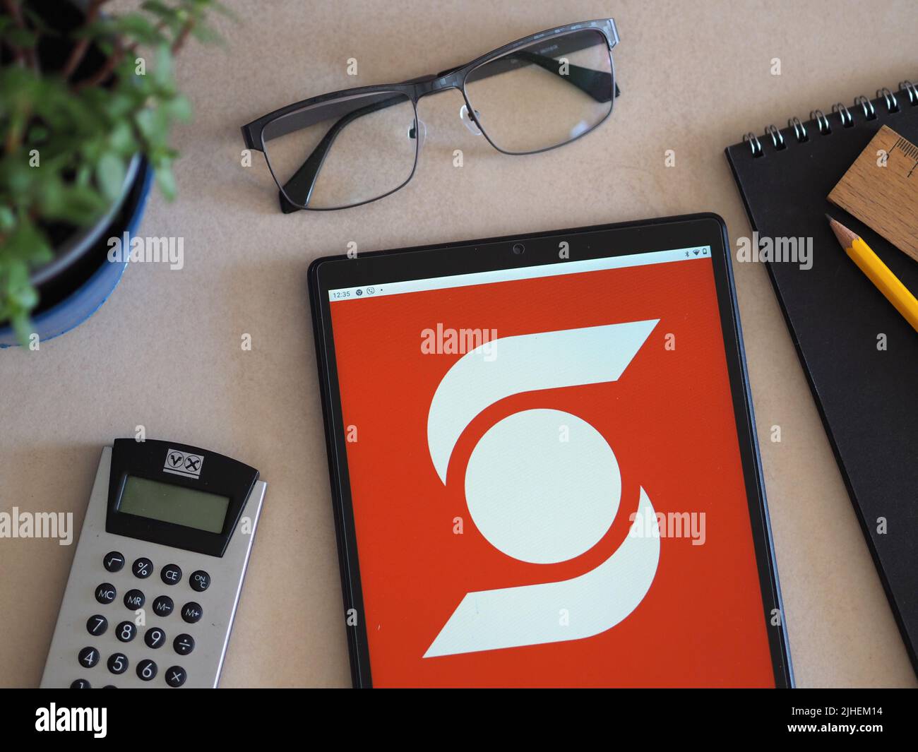 In this photo illustration, ScotiaBank logo seen displayed on a tablet ...