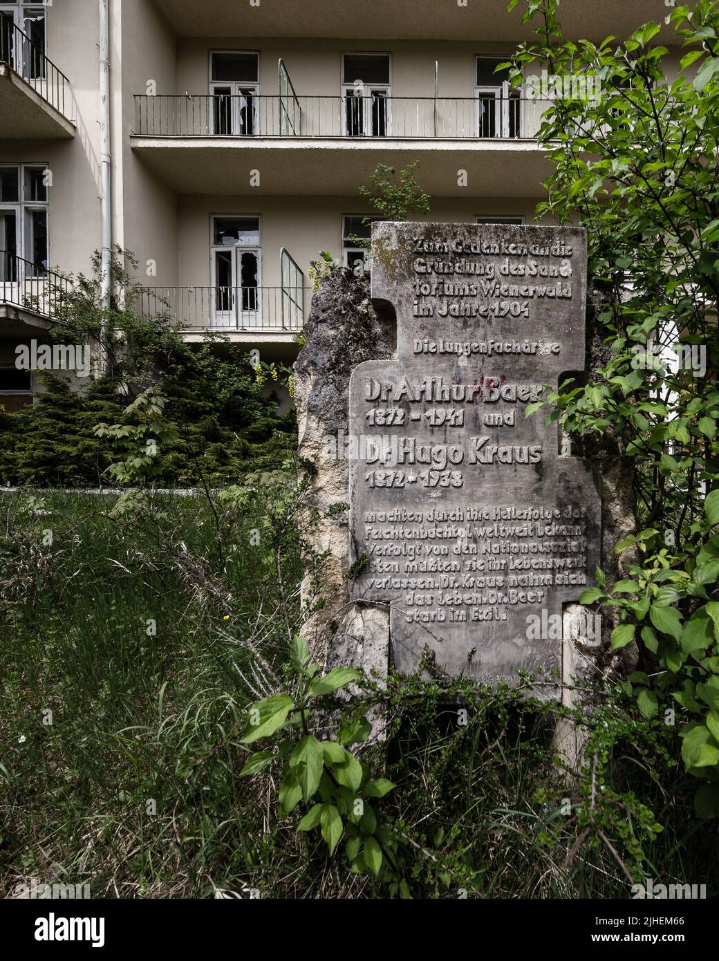 A commemorative plaque for founders Hugo Kraus and Arthur Baer stands ...